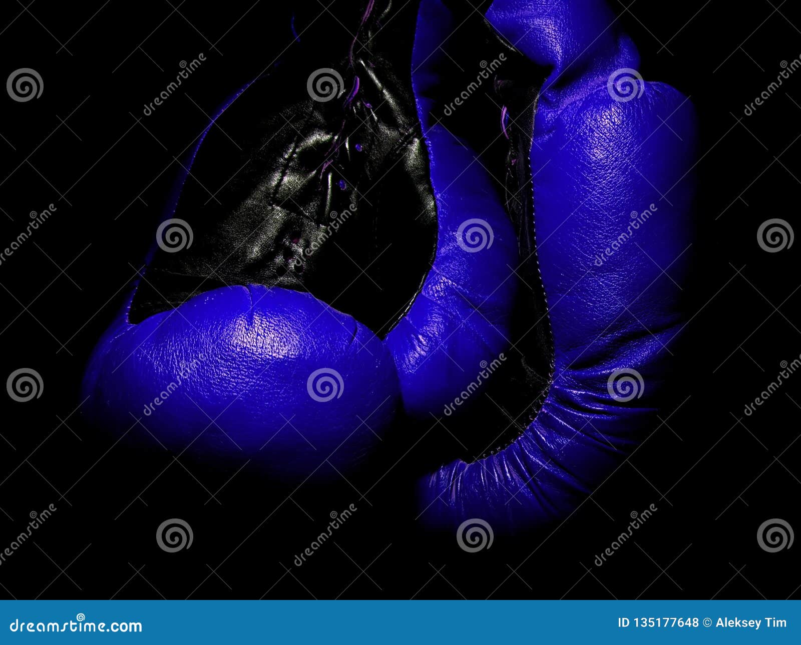 Old Leather Blue Boxing Gloves Hanging in the Dark Stock Photo - Image ...