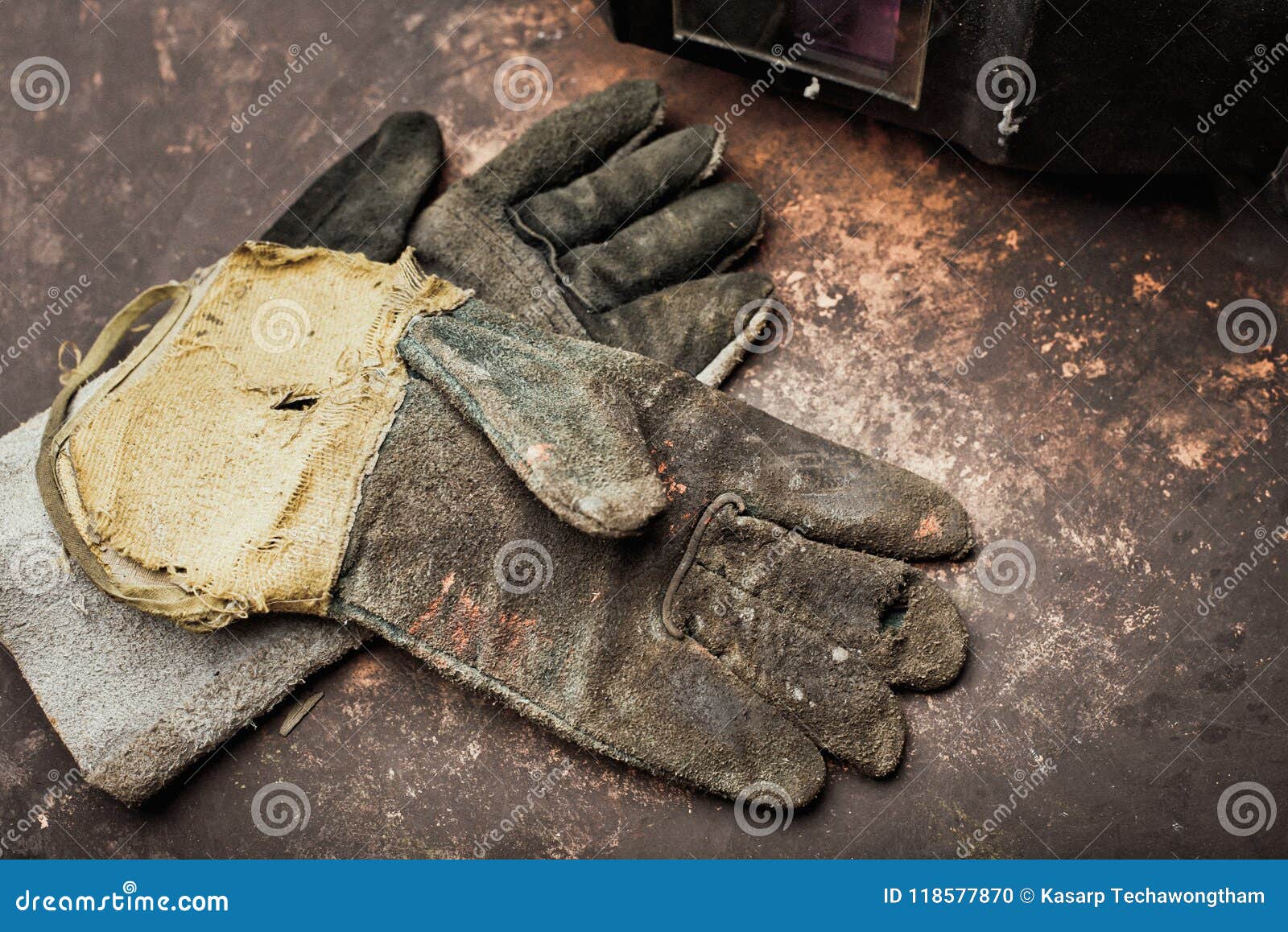 Old Leather Gloves for Welders on Rusty Table Stock Photo - Image of ...