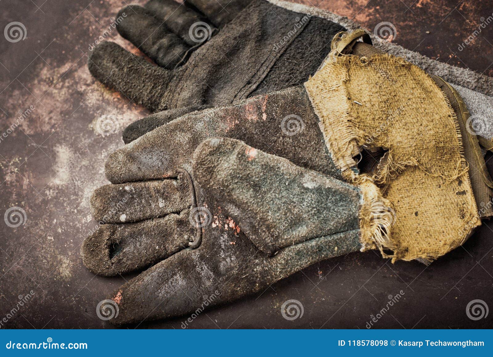 Old Leather Gloves for Welders on Rusty Table Stock Photo - Image of ...