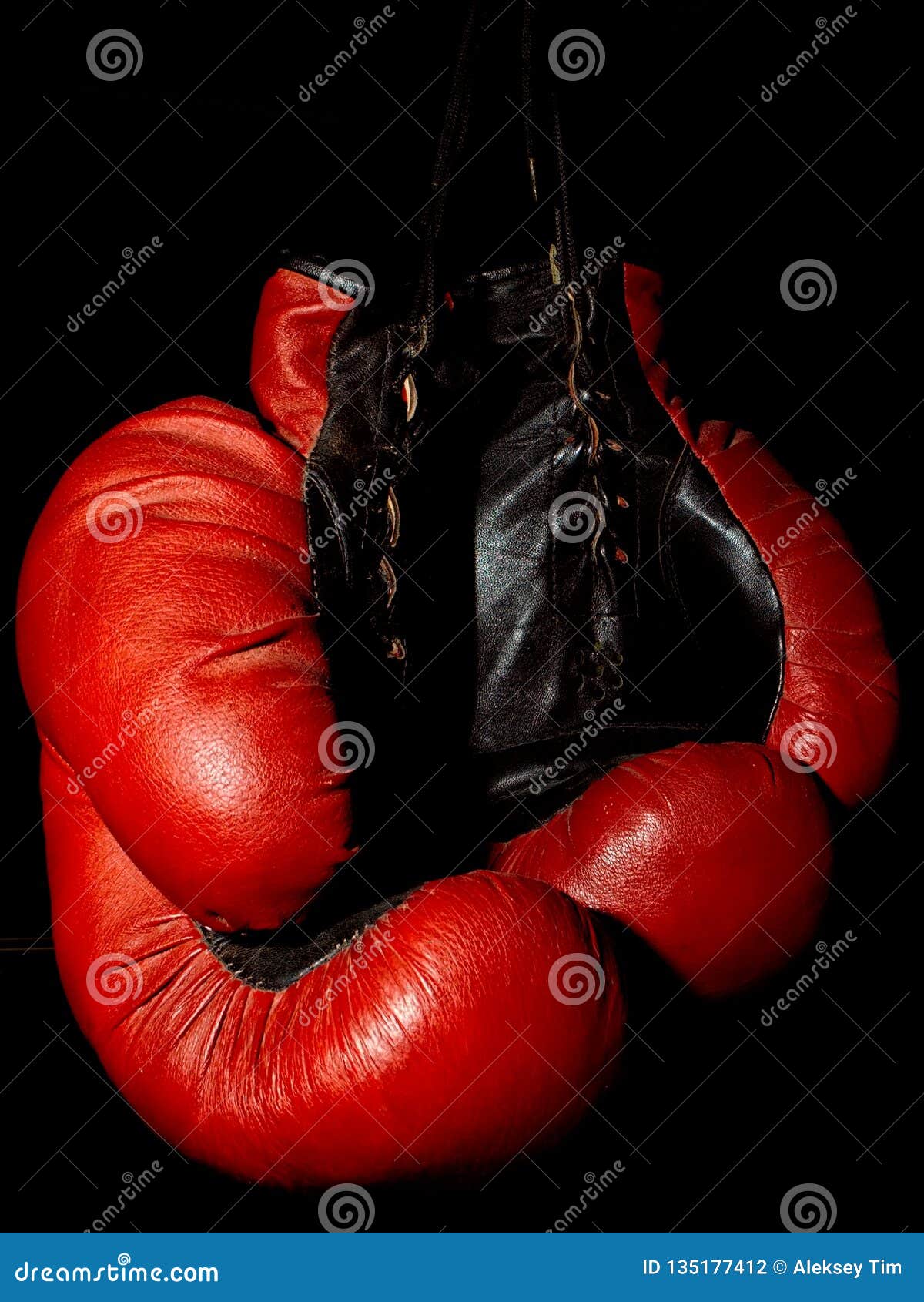 Old Leather Red Boxing Gloves Hanging in the Dark Stock Photo - Image ...