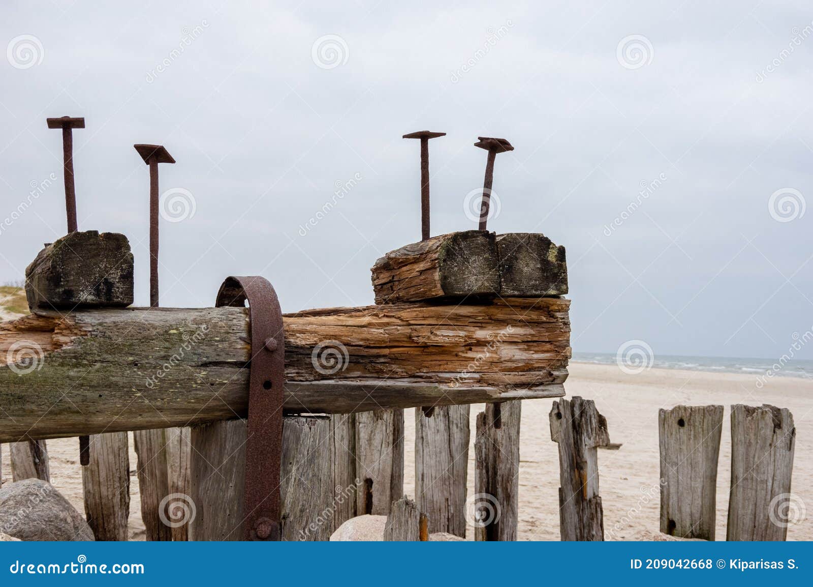 Old Leftovers of an Old Bridge with a Rusty Rivets on a Wooden ...