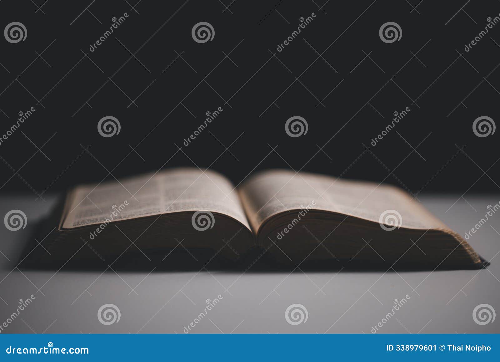 Old Library, an Open Bible Lay on the Table, Its Holy Pages of ...