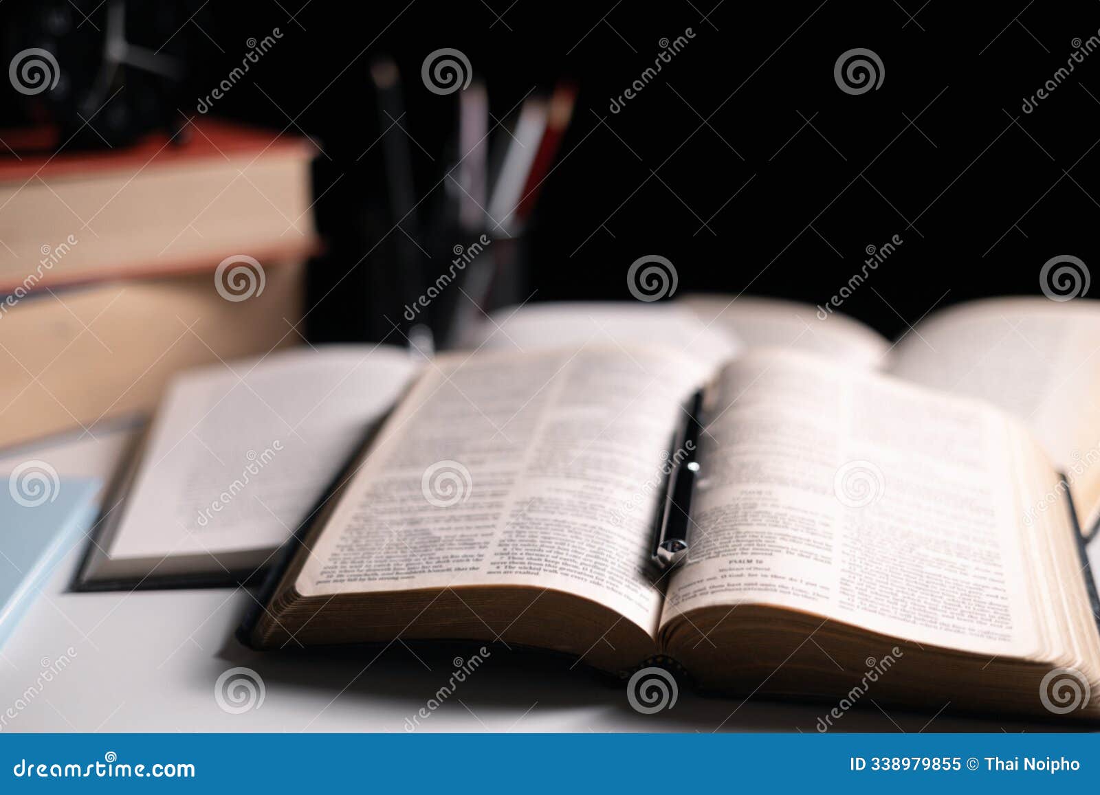 Old Library, an Open Bible Lay on the Table, Its Holy Pages of ...
