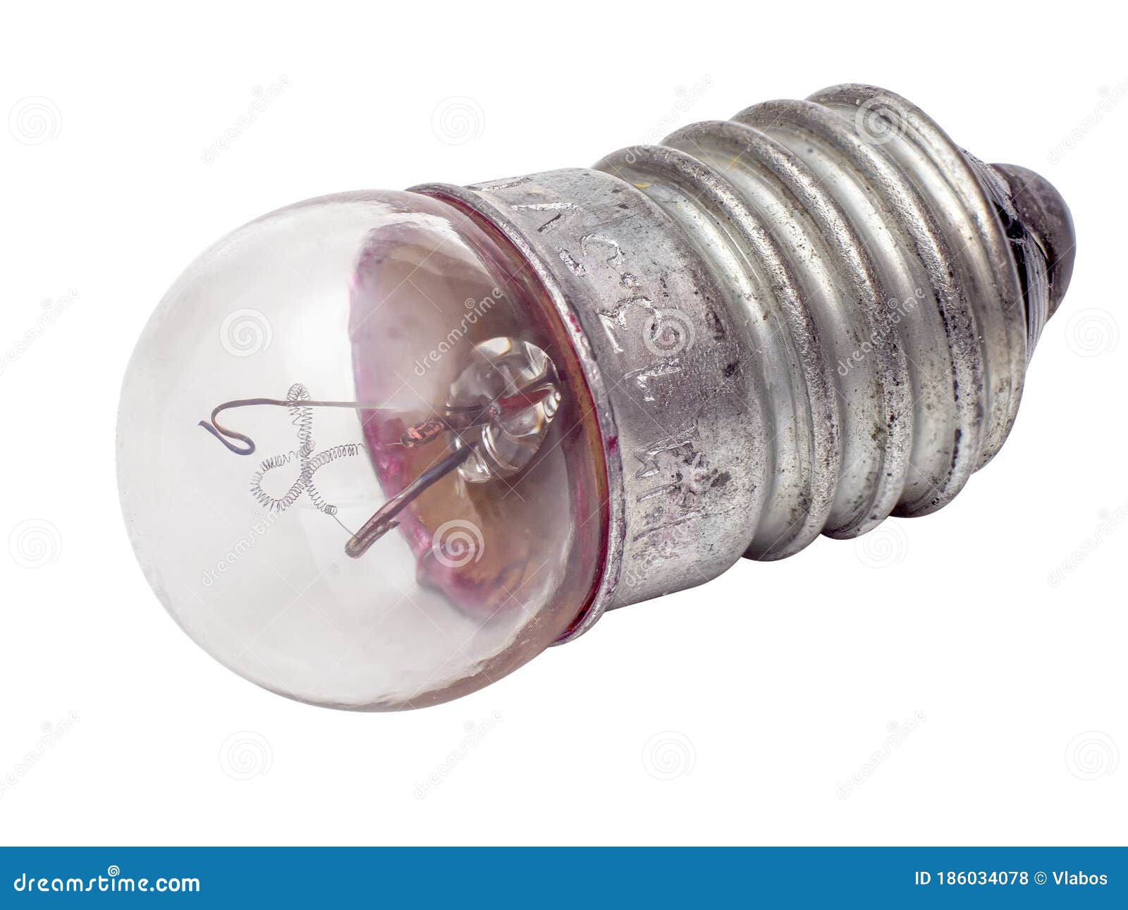 Old Light Bulb from a Flashlight Close-up Isolated on a White ...