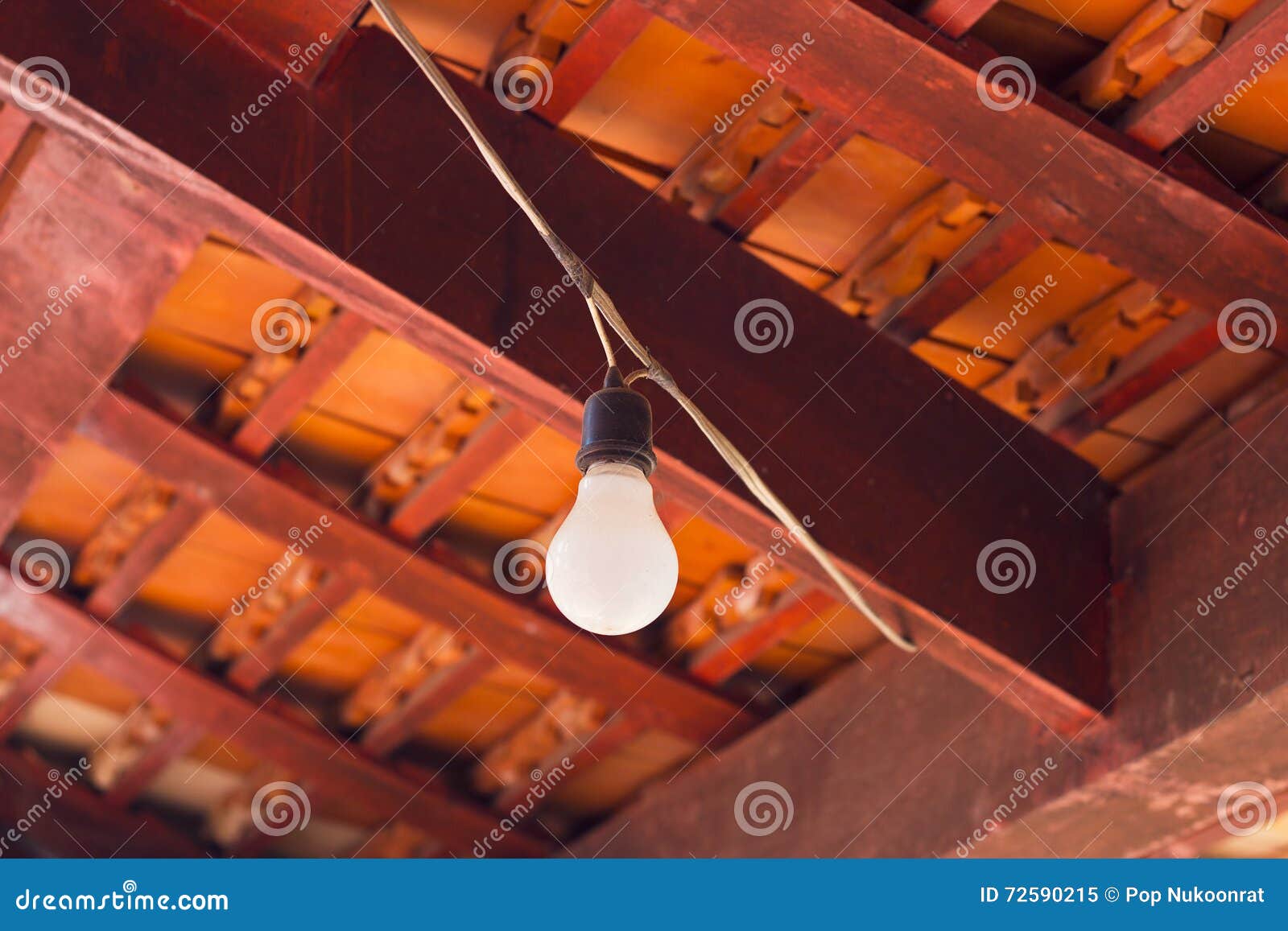 Old Light Bulb Under the Roof Stock Image - Image of roof, glow: 72590215