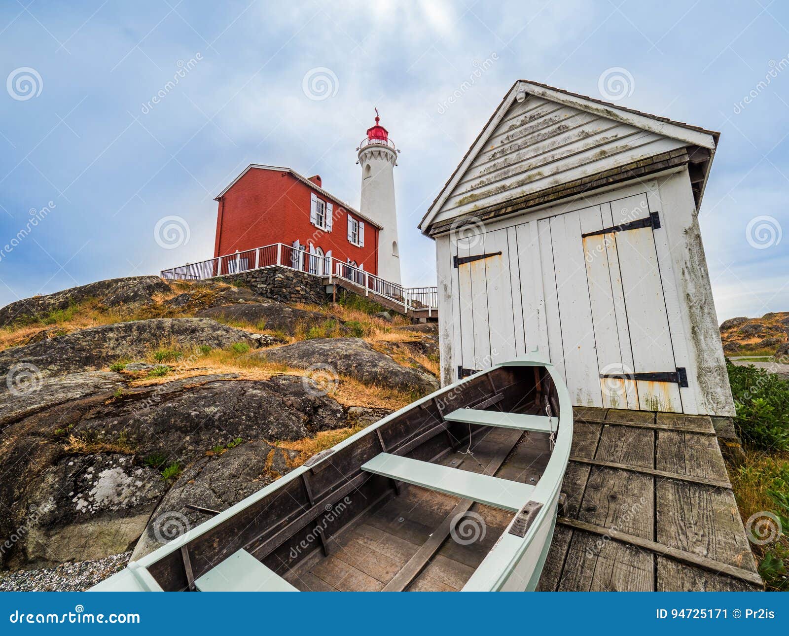 Old Lighthouse with Decrepit Shed and Old Boat Stock Image - Image of ...