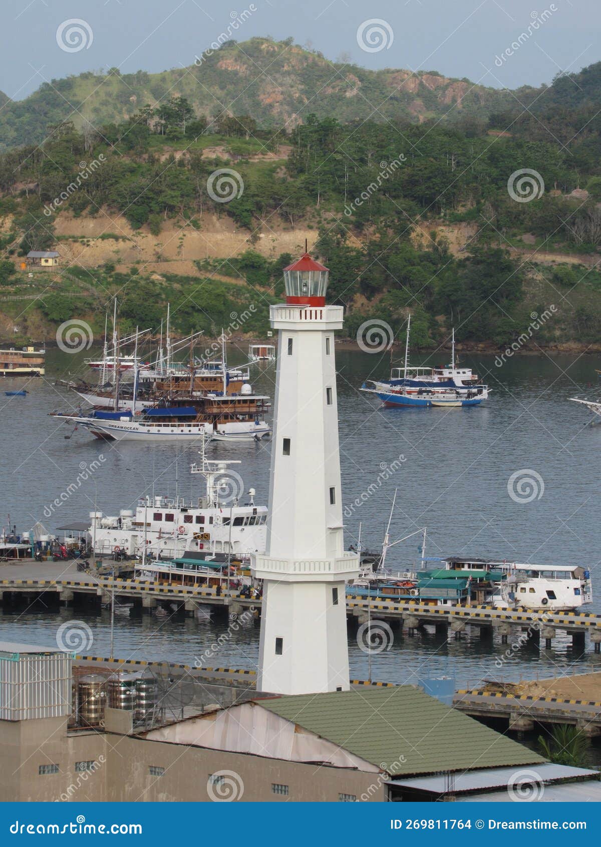 Old Lighthouse at harbor editorial stock image. Image of infrastructure ...