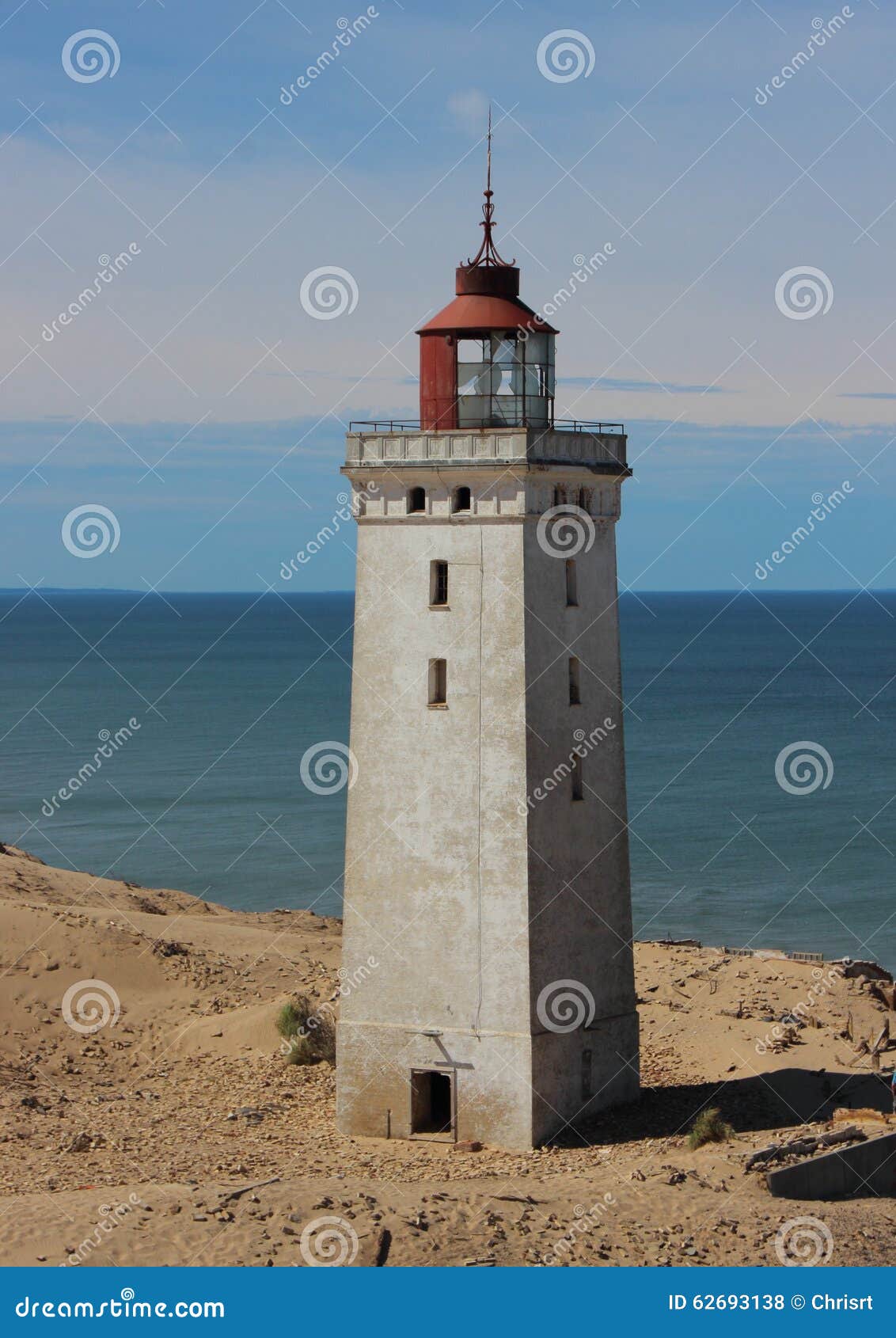 Old Lighthouse and Sand Dune with Ocean in Background Stock Photo ...