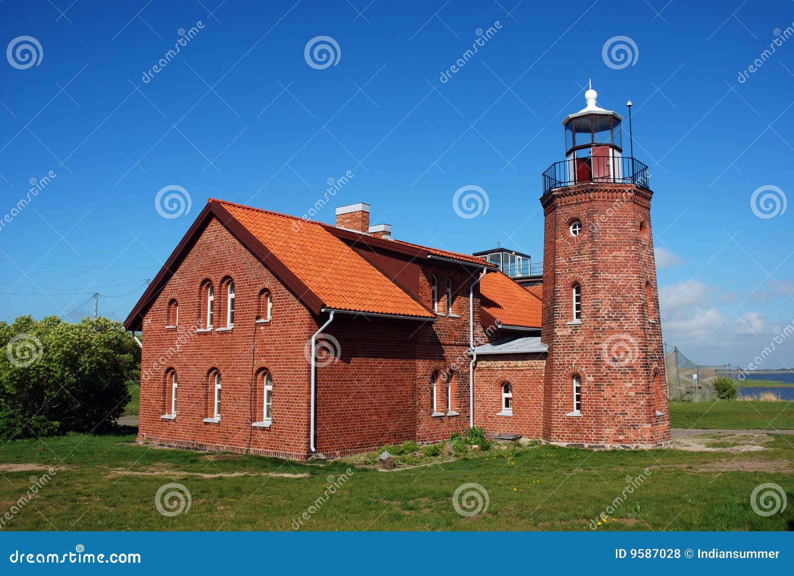 Old lighthouse by the sea stock photo. Image of lithuania - 9587028