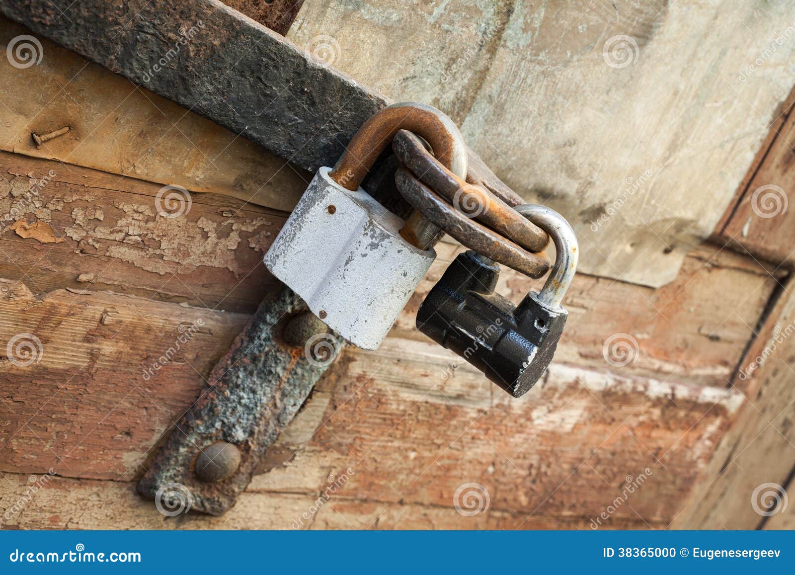 Old locks on wooden door stock photo. Image of barn, secure - 38365000