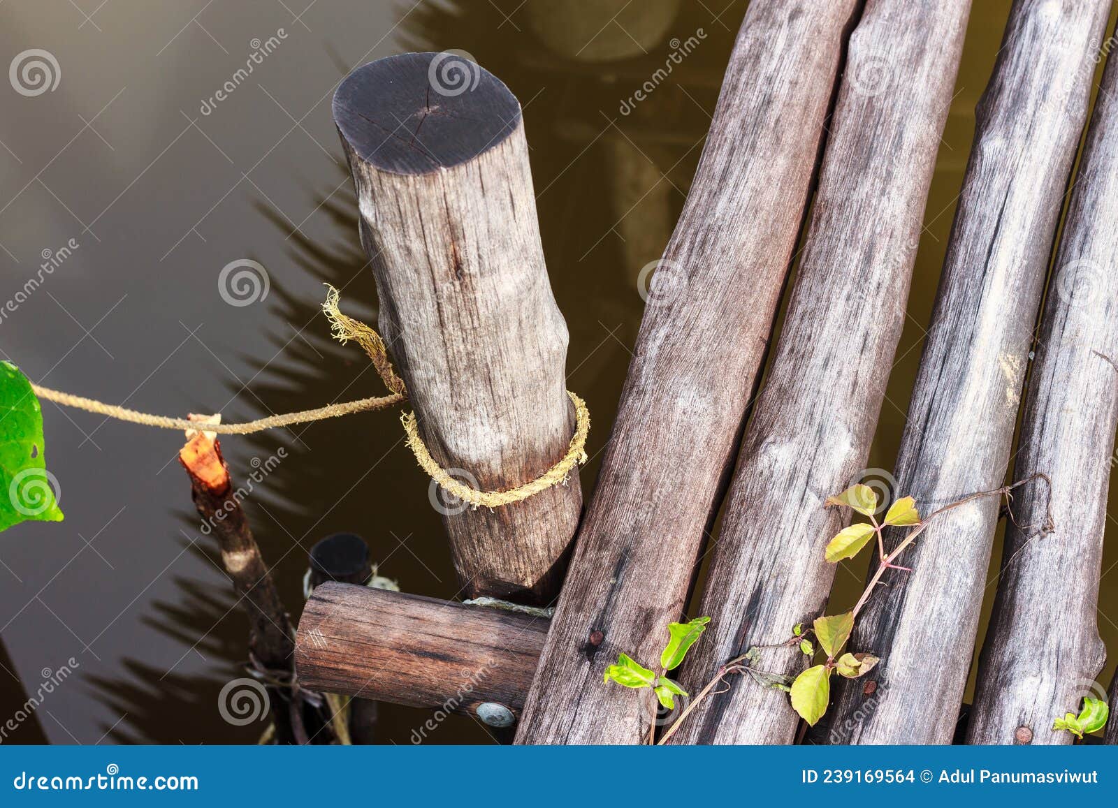 Old Log Bridge and Log for Mooring. Stock Photo - Image of empty, boat ...