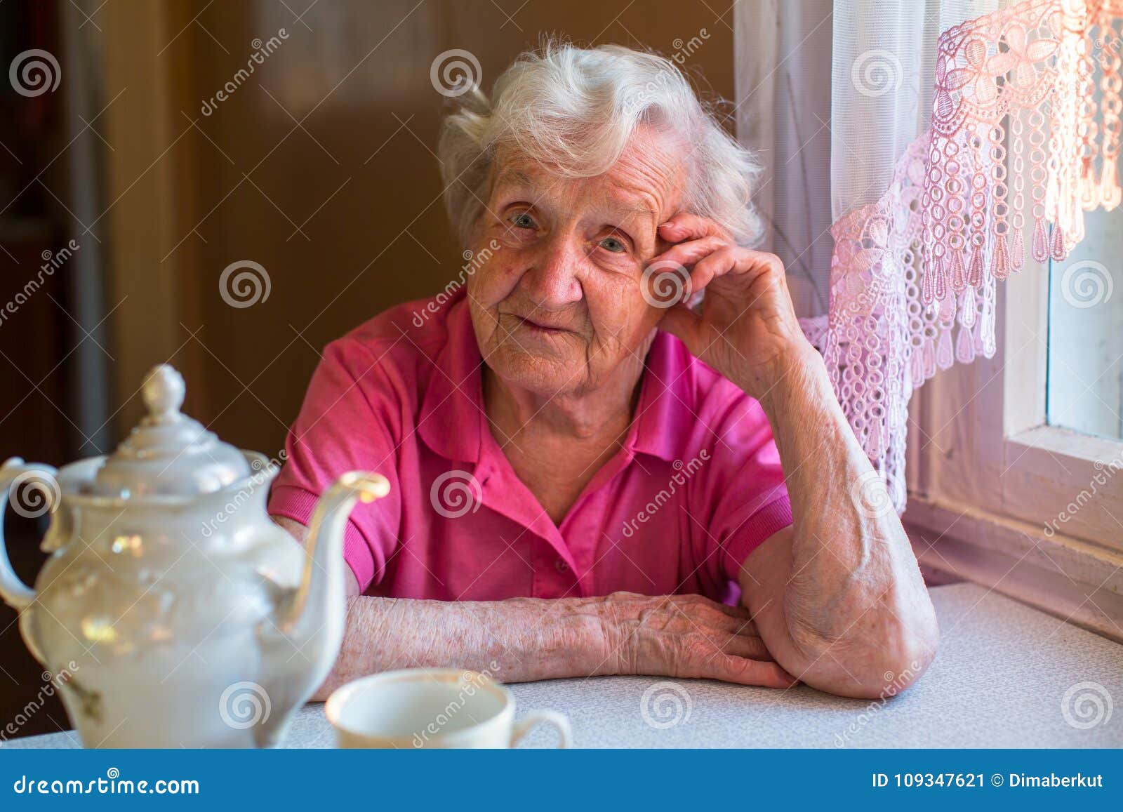 Old Lone Lady Drinking Tea Sitting in the Kitchen. Stock Image - Image ...