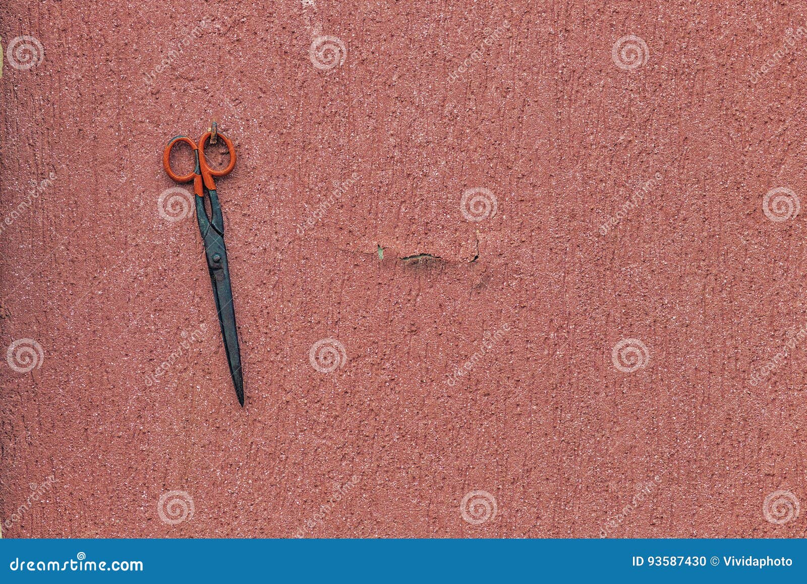 Rusty scissors on old wall stock photo. Image of scissors - 93587430