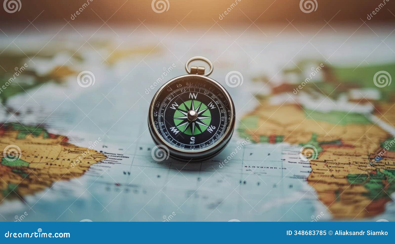 Old Magnetic Compass on a World Map Geography and Navigation Macro ...