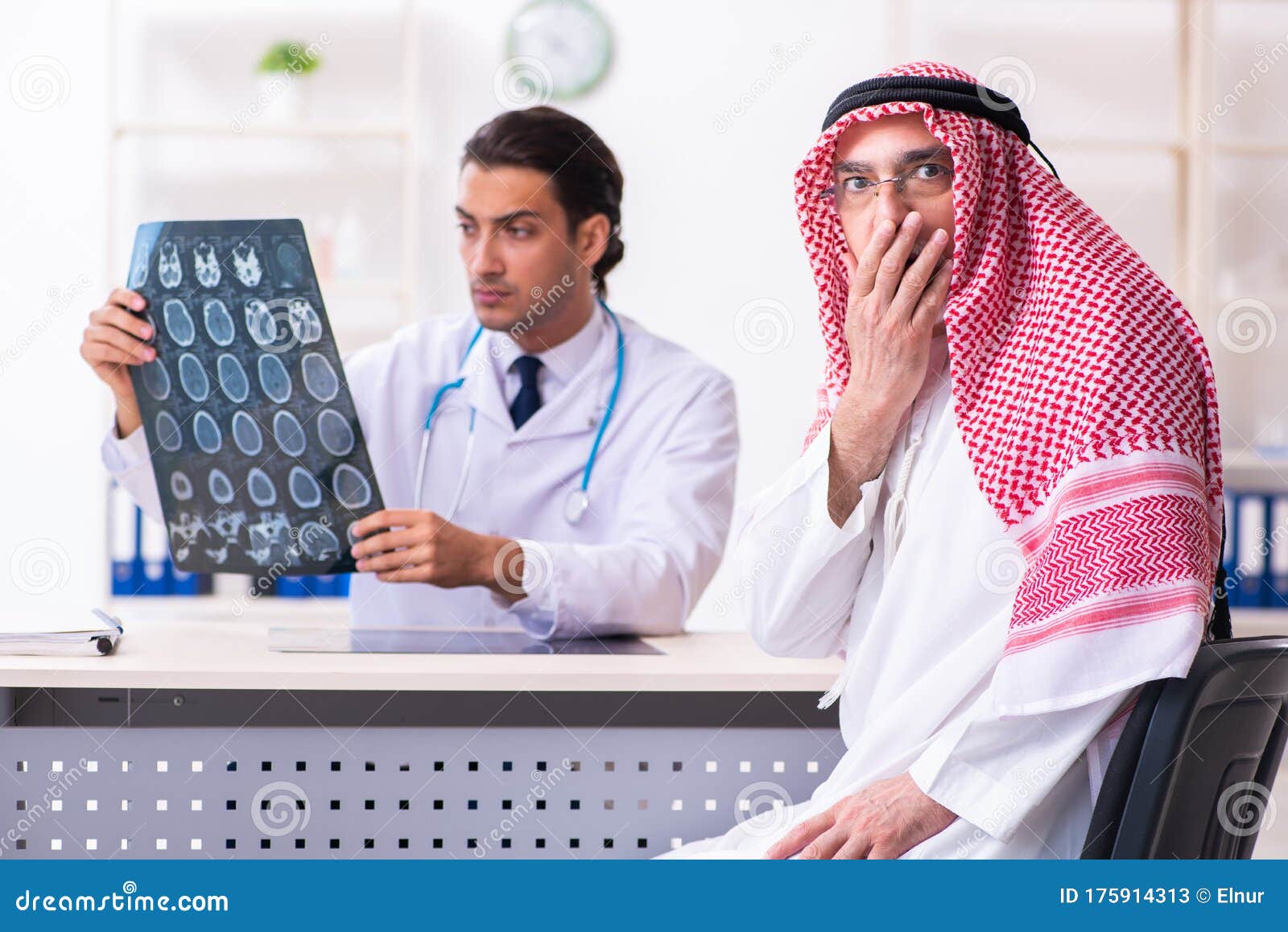 Old Male Arab Visiting Young Male Doctor Stock Image - Image of ...