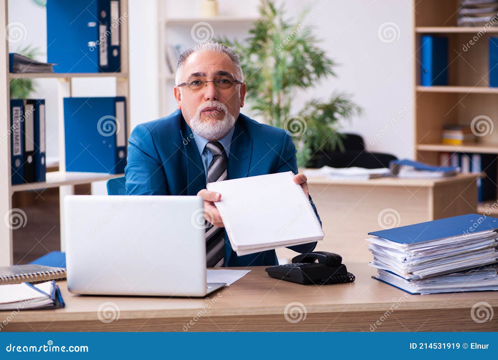 Old Male Bookkeeper Unhappy with Excessive Work at Workplace Stock ...