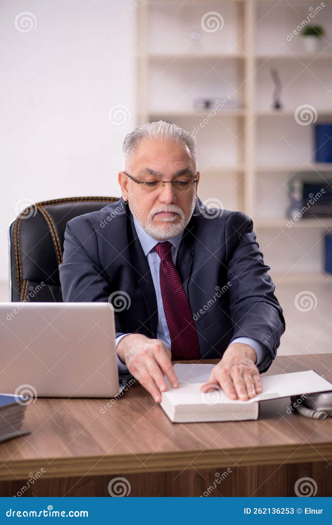 Old Male Boss Reading Book at Workplace Stock Image - Image of boss ...