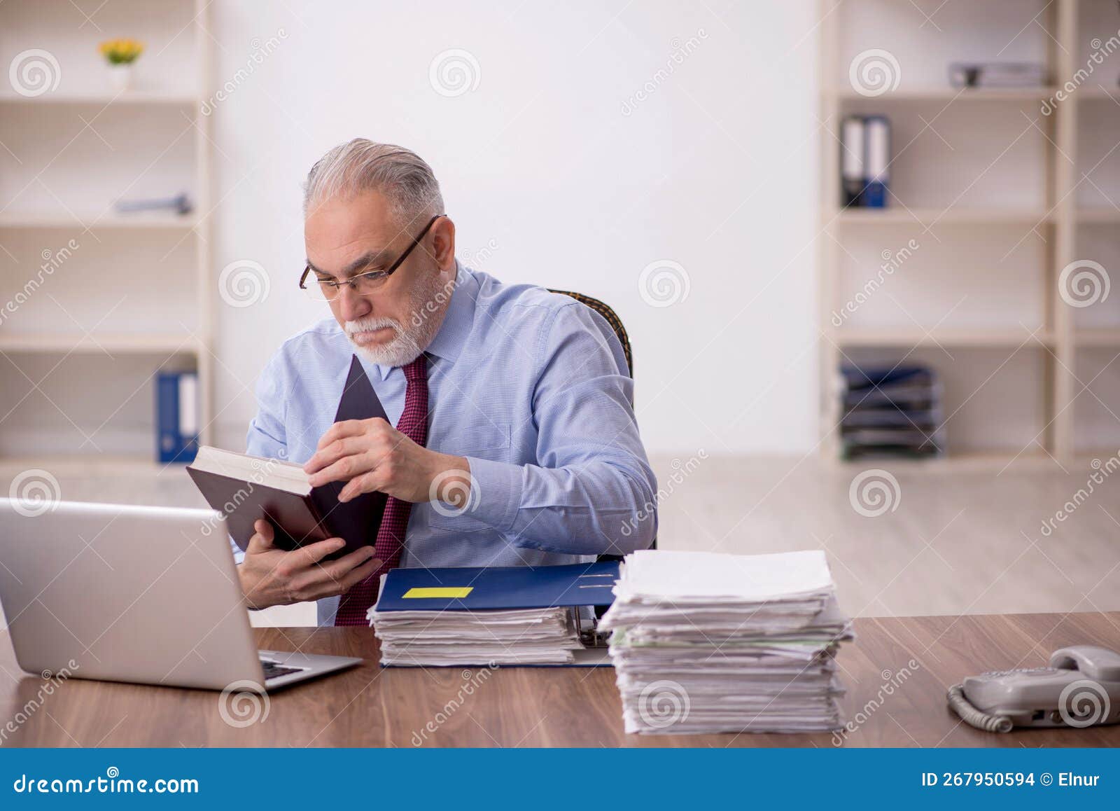 Old Male Boss Reading Book at Workplace Stock Photo - Image of ...