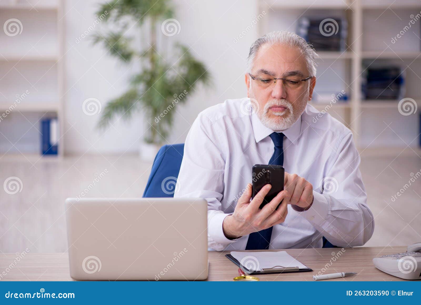 Old Male Boss Working at Workplace Stock Photo - Image of desk, texting ...