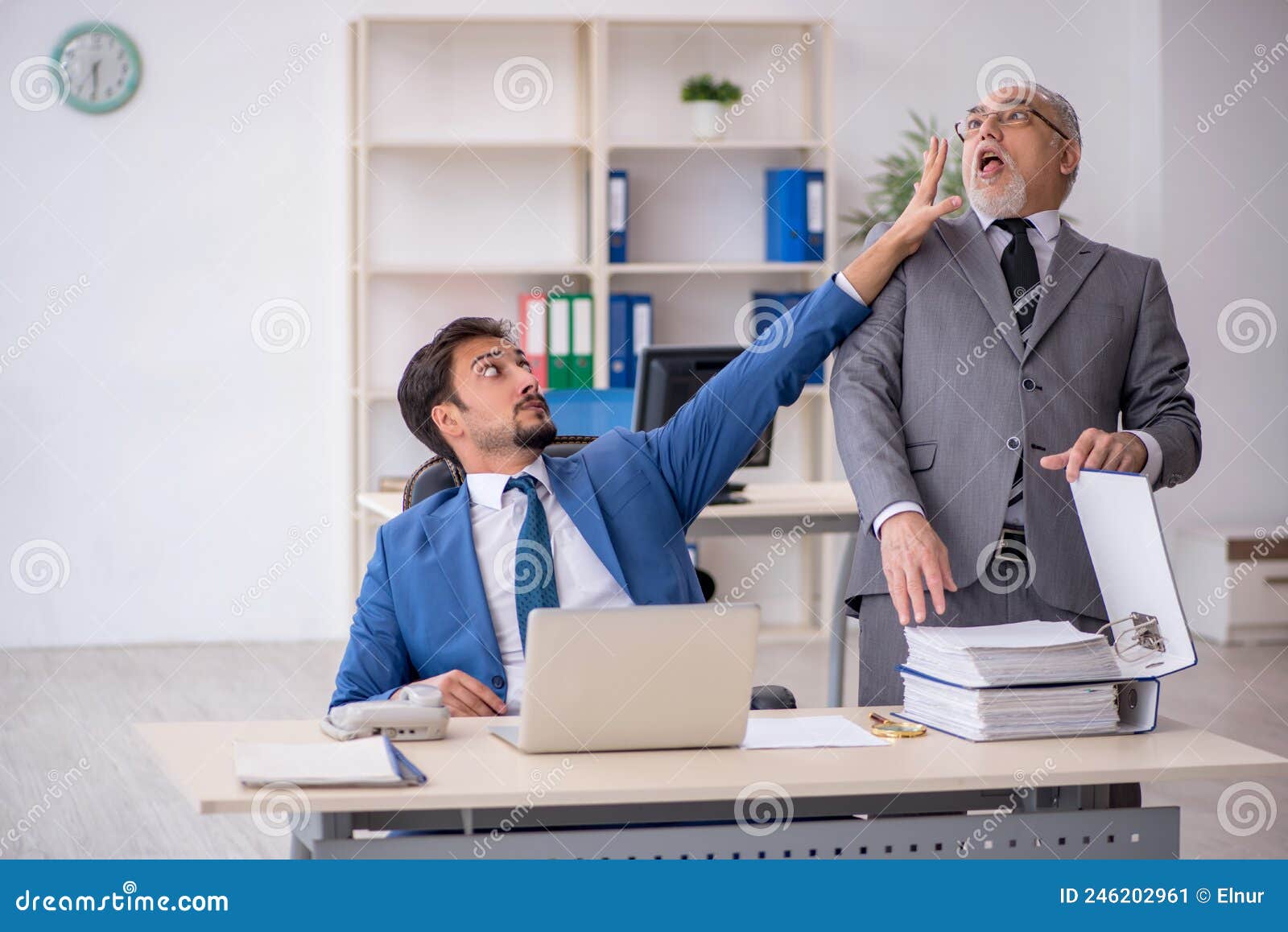Old Male Boss and Young Male Employee Working in the Office Stock Image ...