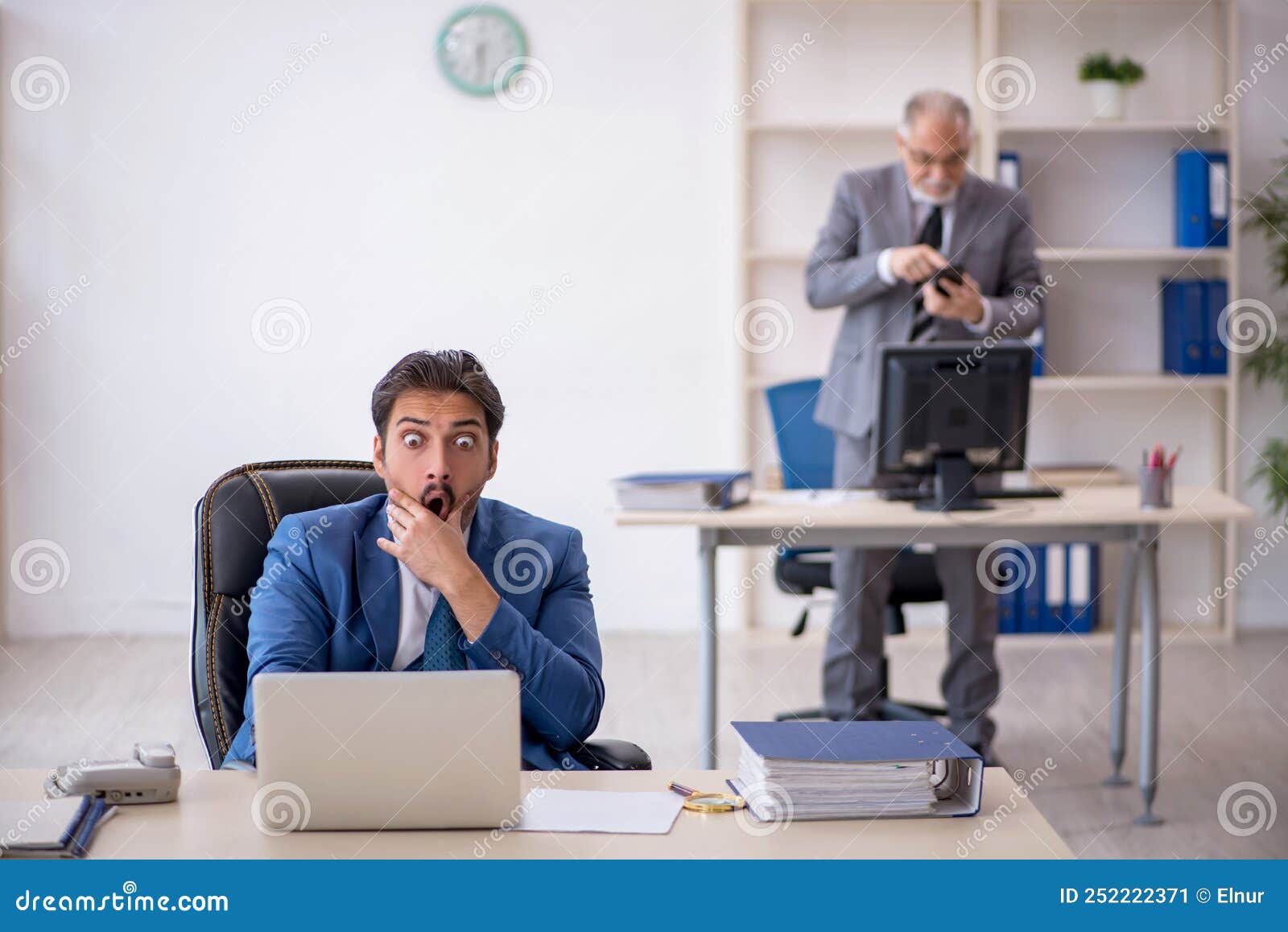 Old Male Boss and Young Male Employee Working in the Office Stock Image ...