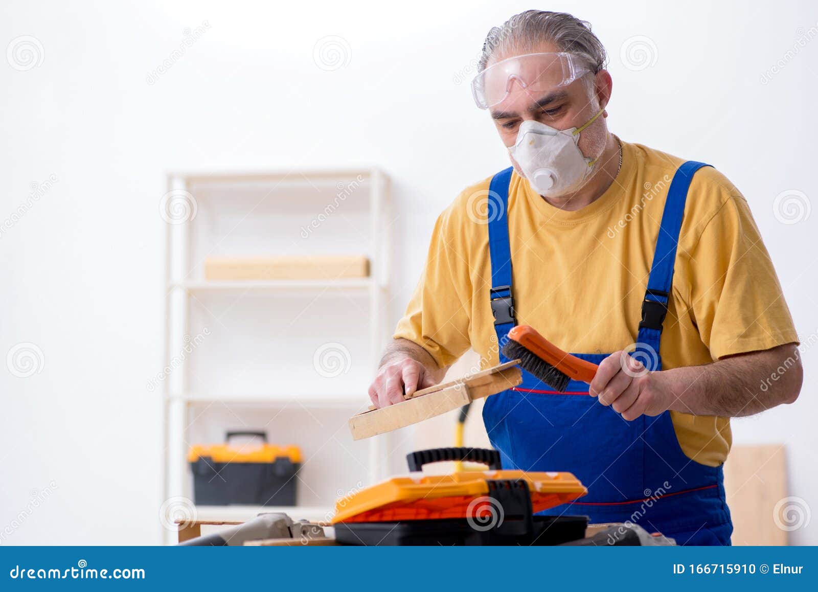 Old Male Carpenter Working in Workshop Stock Photo - Image of cleaning ...