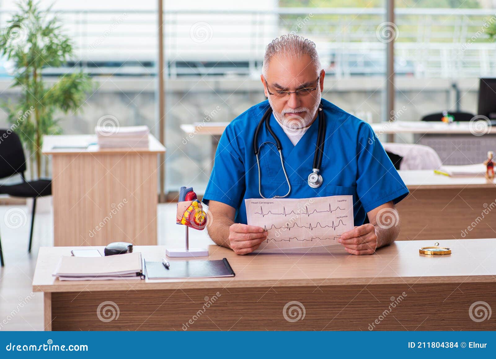 Old Male Doctor Cardiologist Working in the Clinic Stock Photo - Image ...