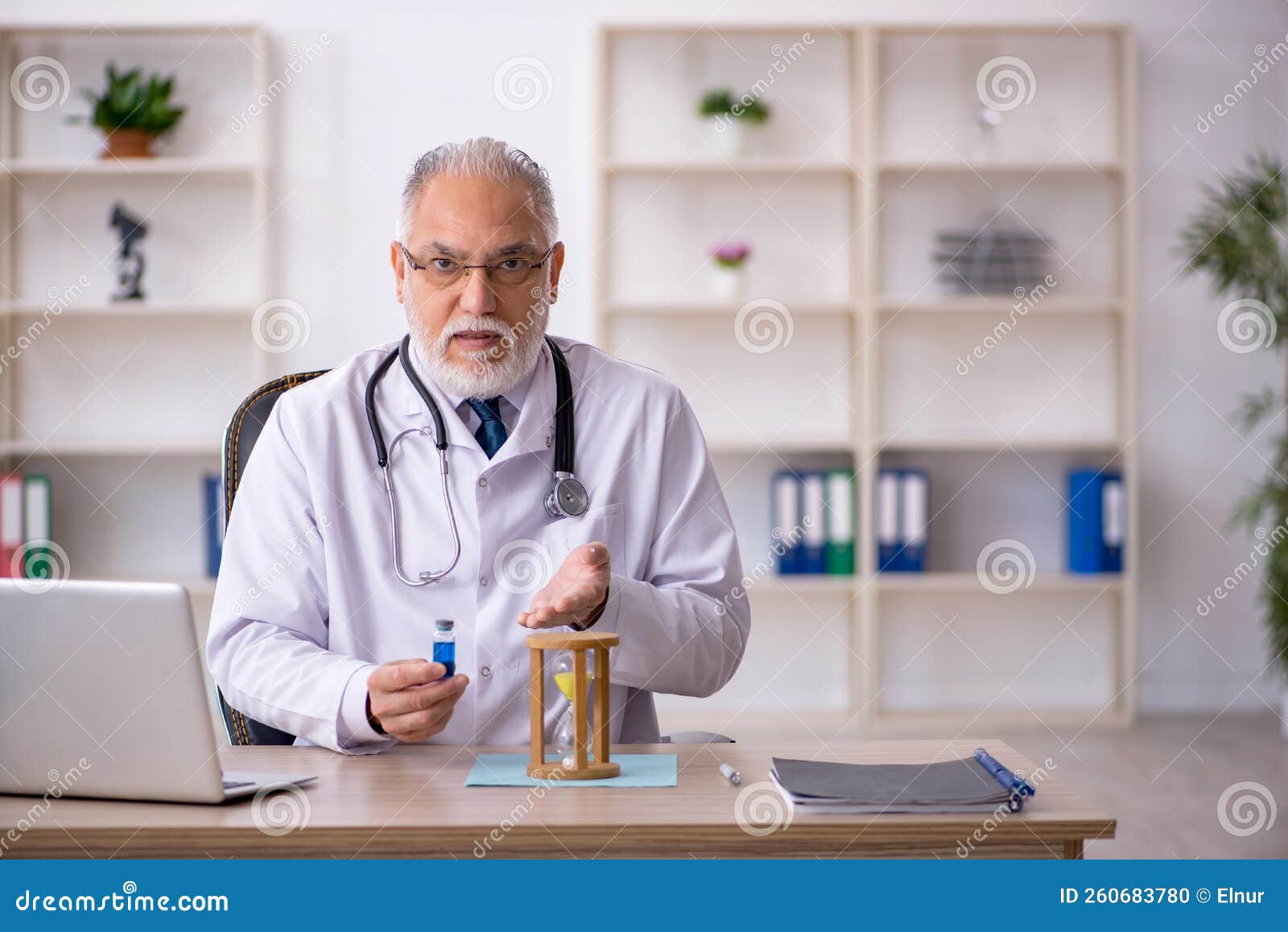 Old Male Doctor in Time Management Concept Stock Photo - Image of timer ...