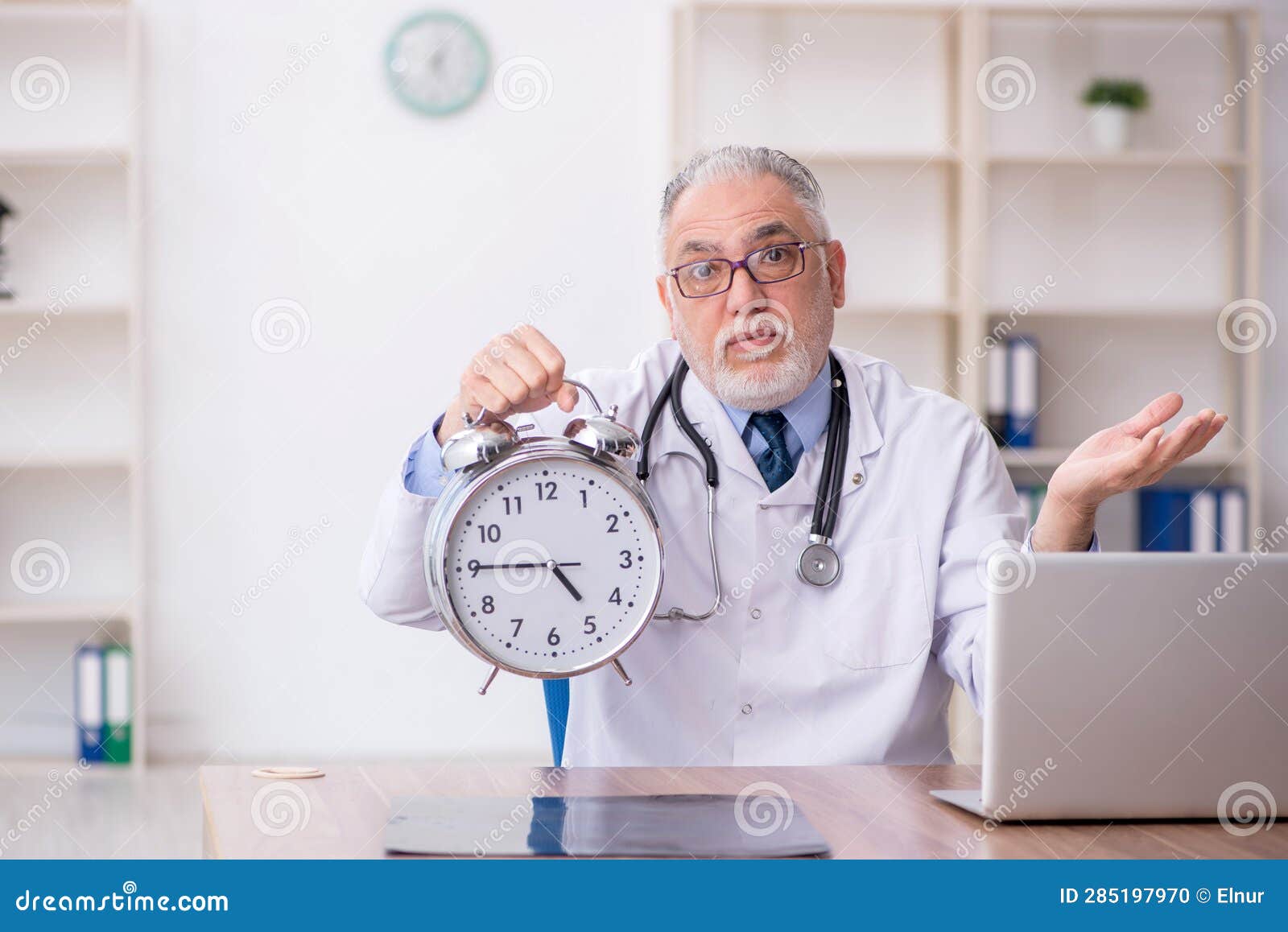 Old Male Doctor in Time Management Concept Stock Photo - Image of ...
