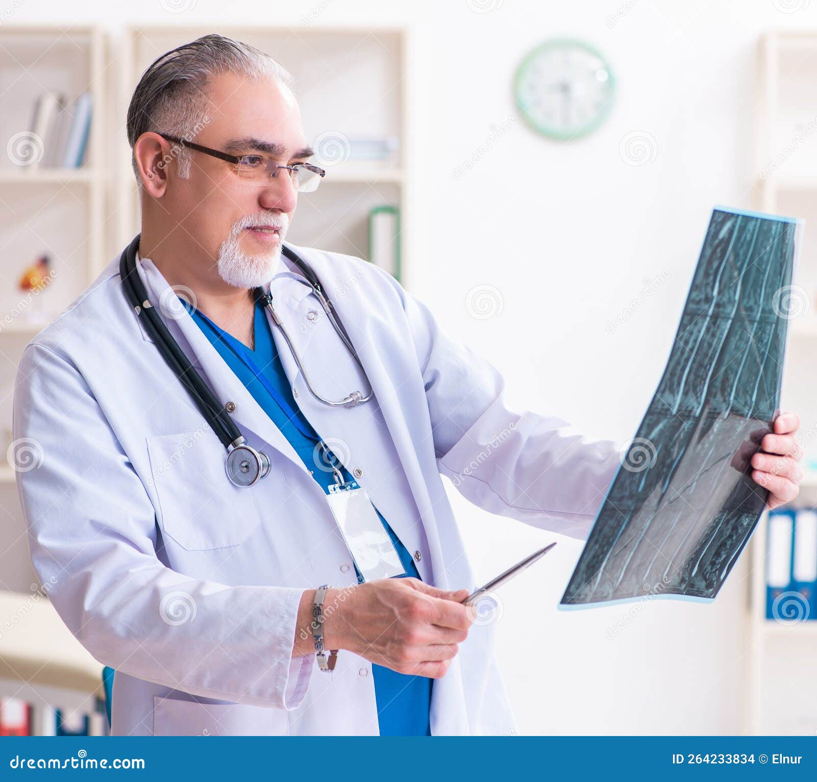 Old Male Doctor Working in the Clinic Stock Photo - Image of ...