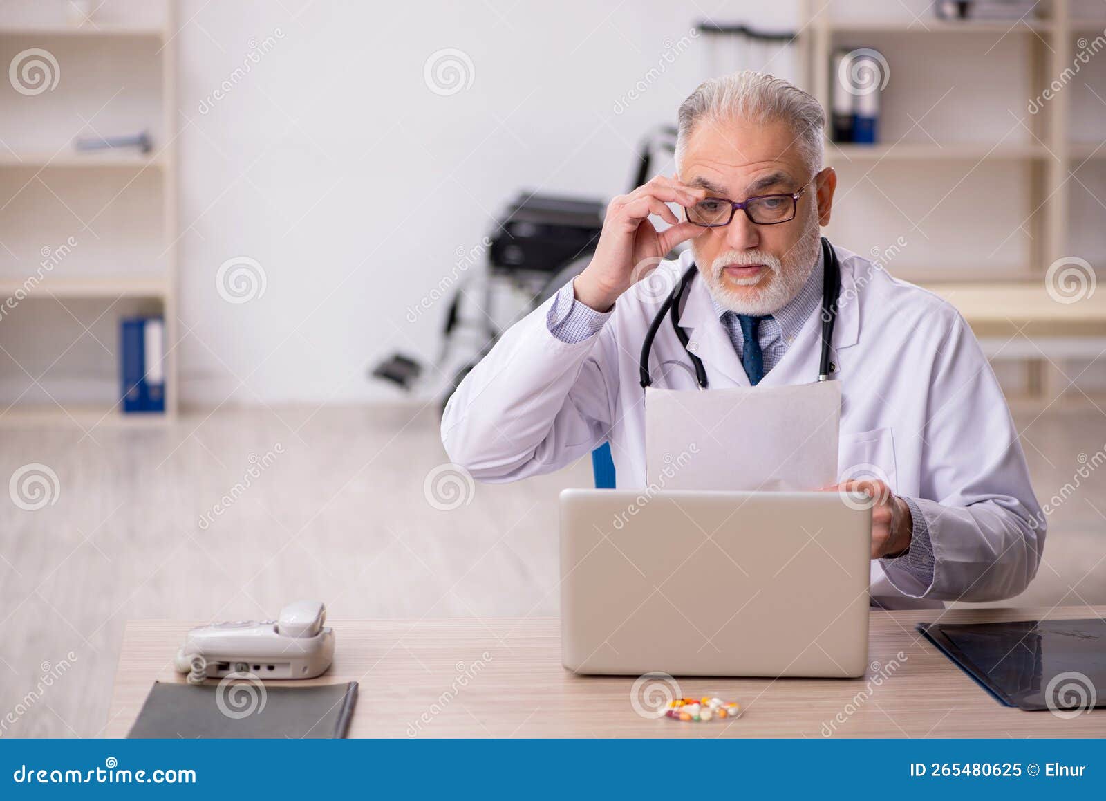 Old Male Doctor Working in the Clinic Stock Image - Image of ...