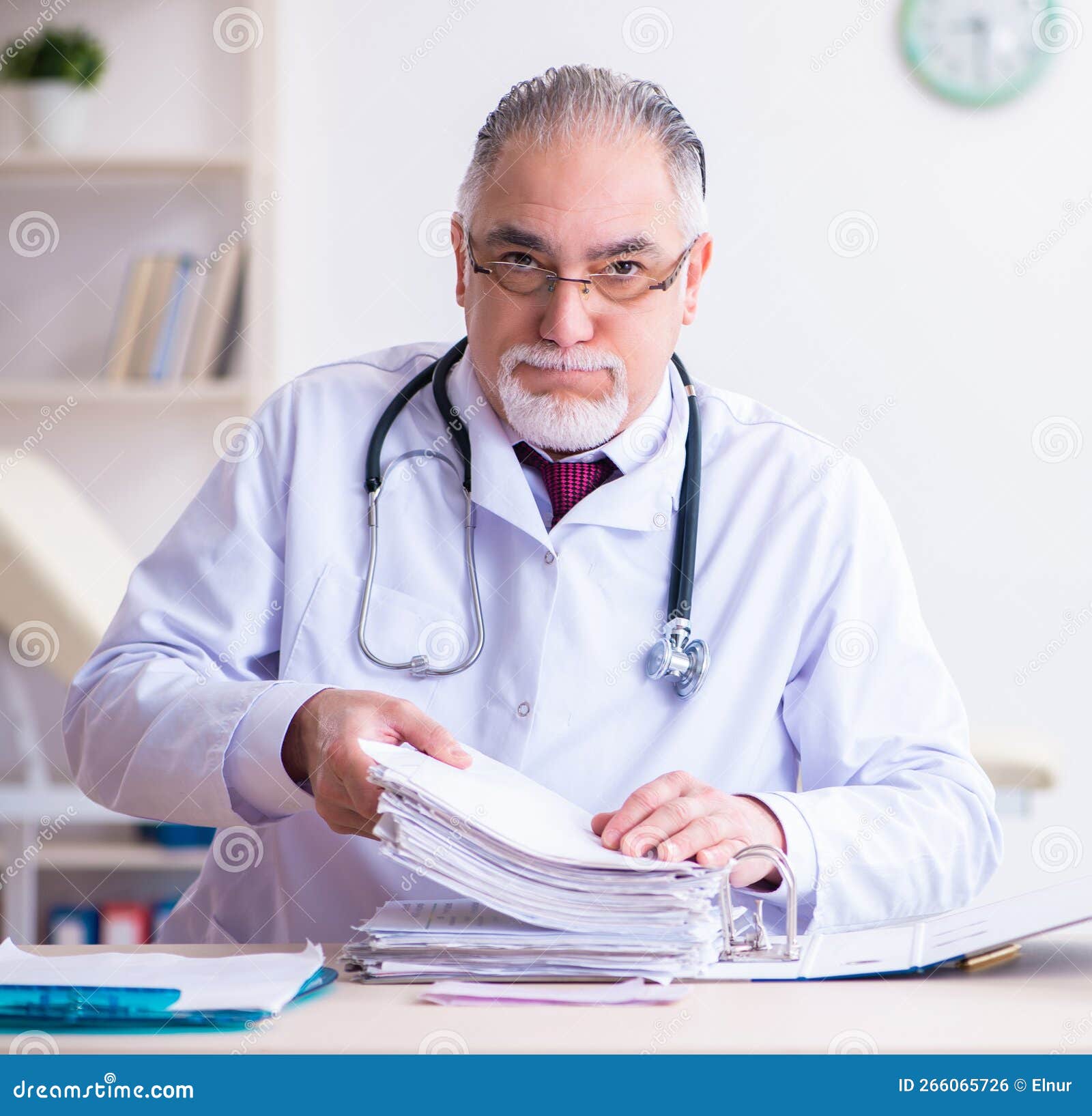 Old Male Doctor Working in the Clinic Stock Photo - Image of case ...