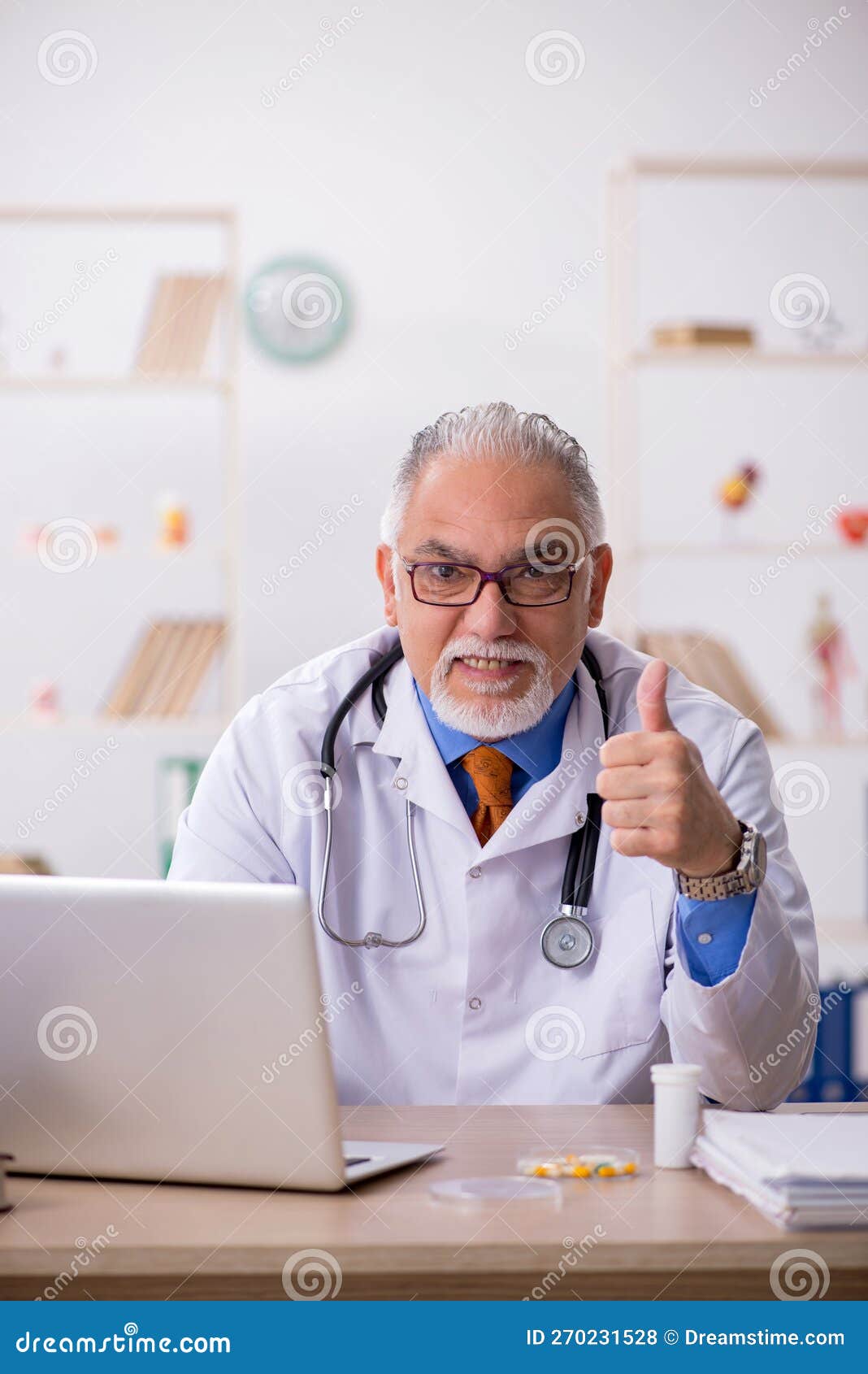 Old Male Doctor Working in the Clinic Stock Photo - Image of medical ...