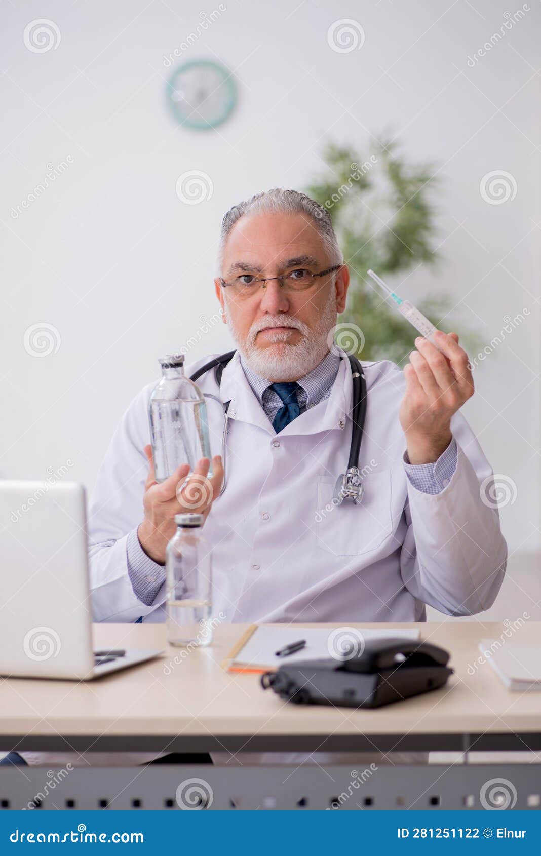 Old Male Doctor Working in the Clinic Stock Photo - Image of ...