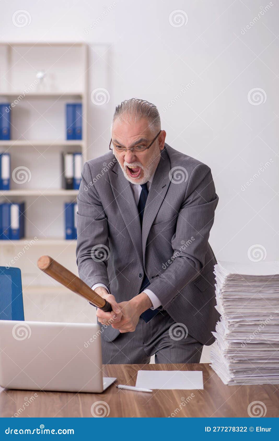 Old Male Employee Holding Baseball Bat at Workplace Stock Photo - Image ...