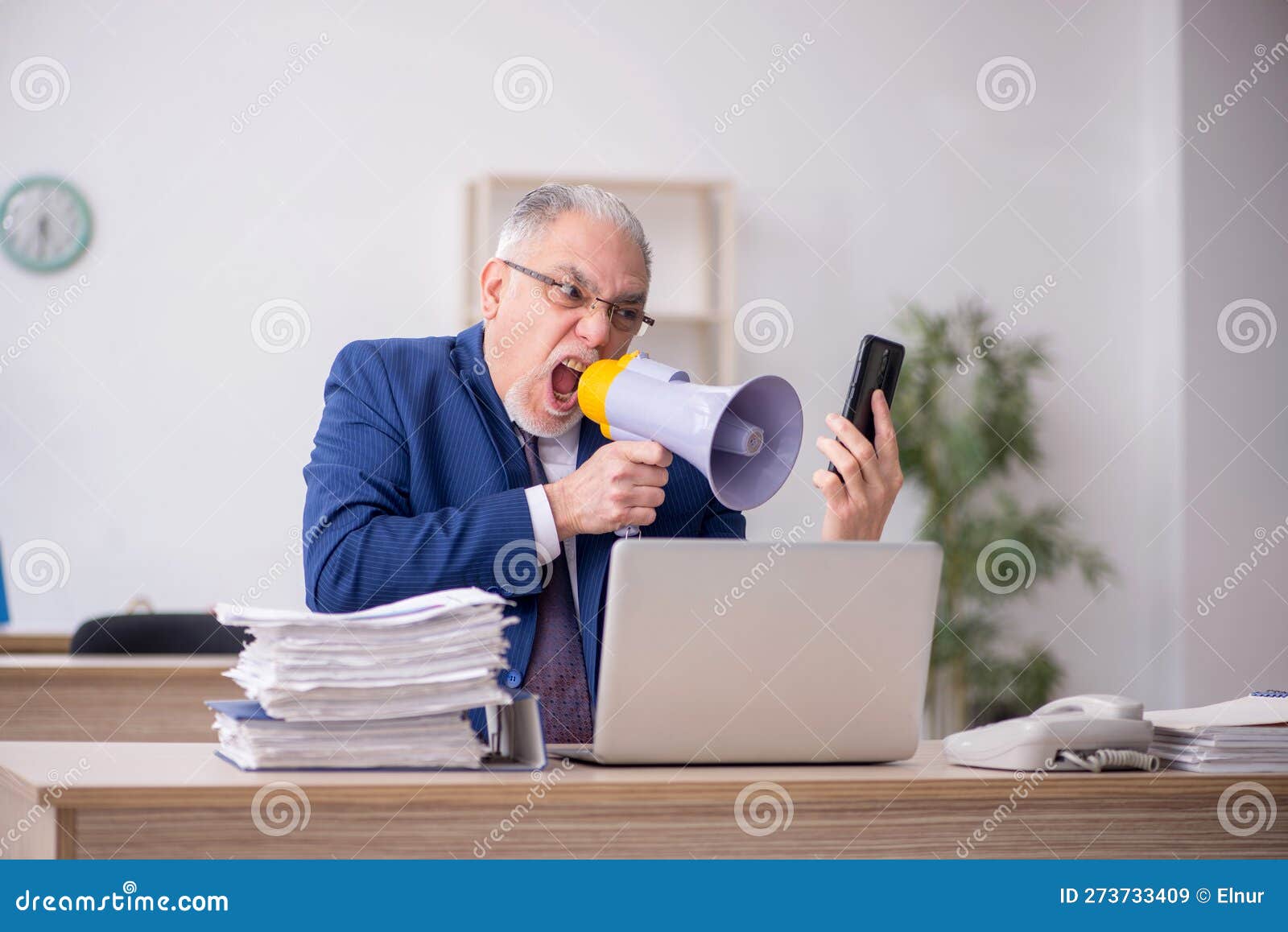 Old Male Employee Holding Megaphone at Workplace Stock Image - Image of ...