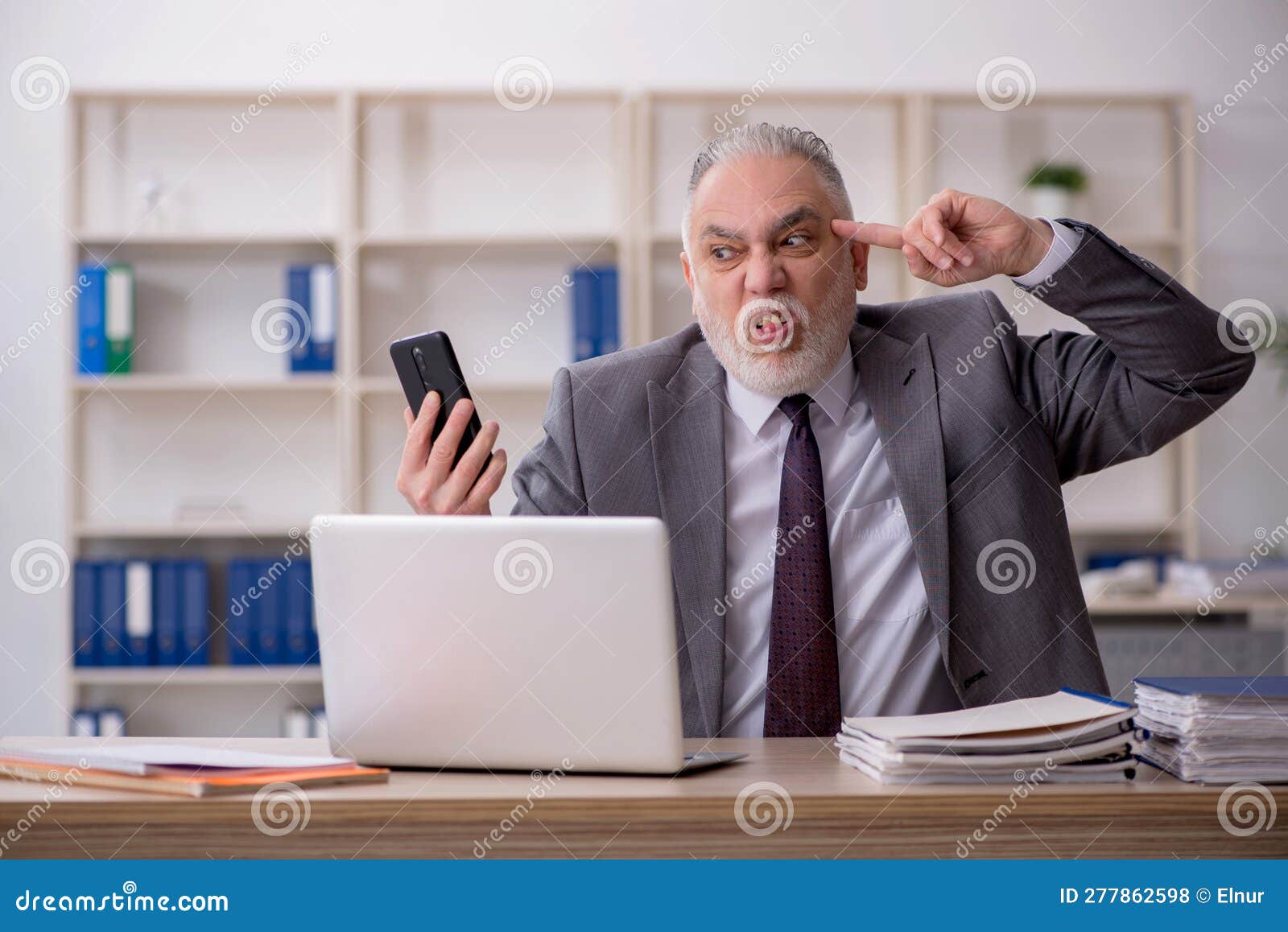Old Male Employee Speaking by Phone at Workplace Stock Photo - Image of ...