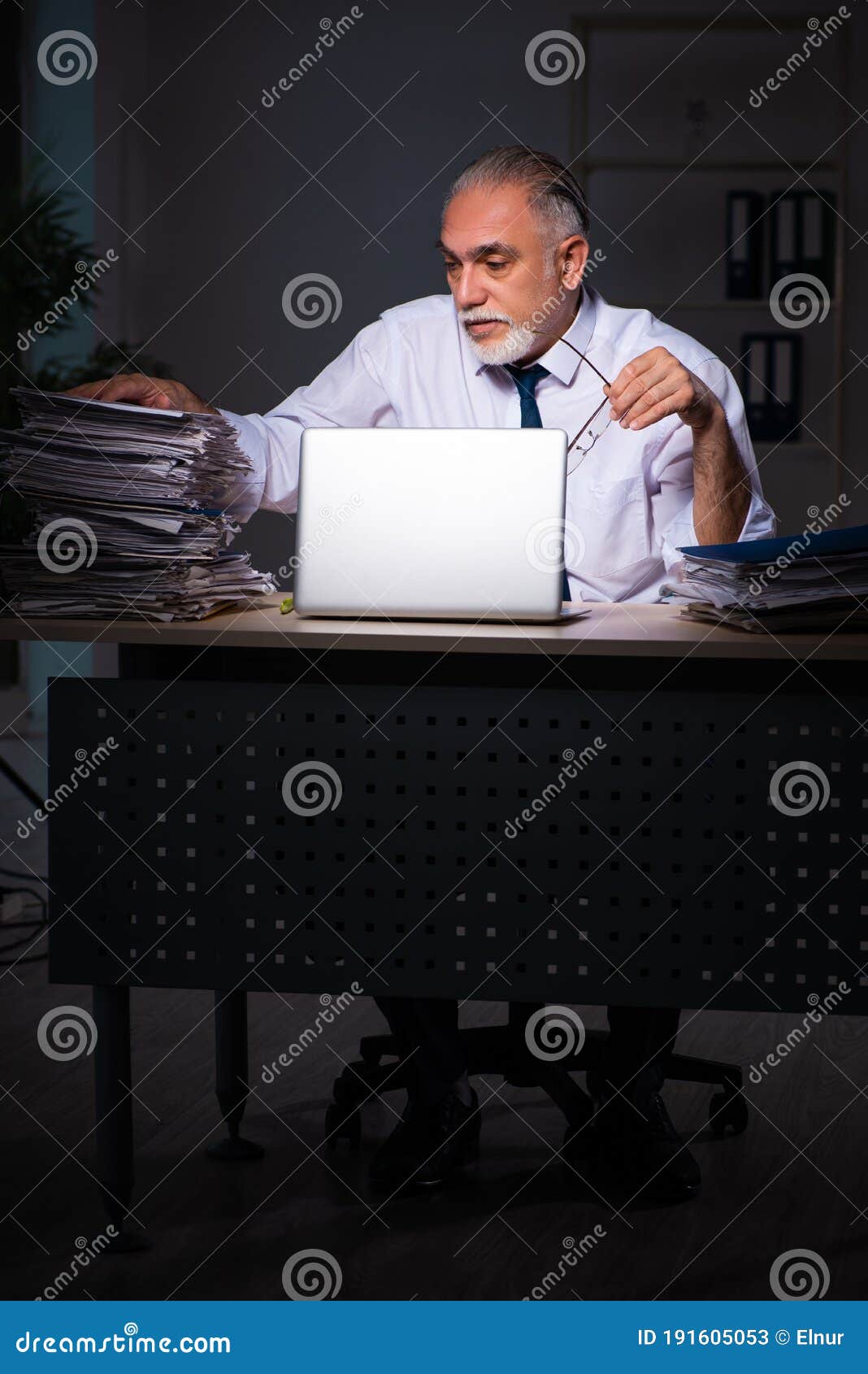 Old Male Employee Working Late at Workplace Stock Image - Image of ...