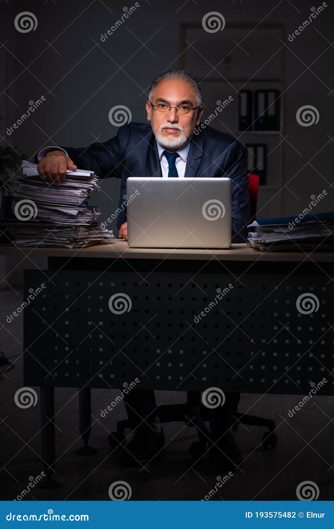 Old Male Employee Working Late at Workplace Stock Photo - Image of ...