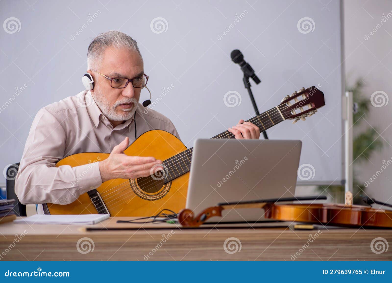 Old Male Music Teacher in the Classroom Stock Image - Image of remote ...