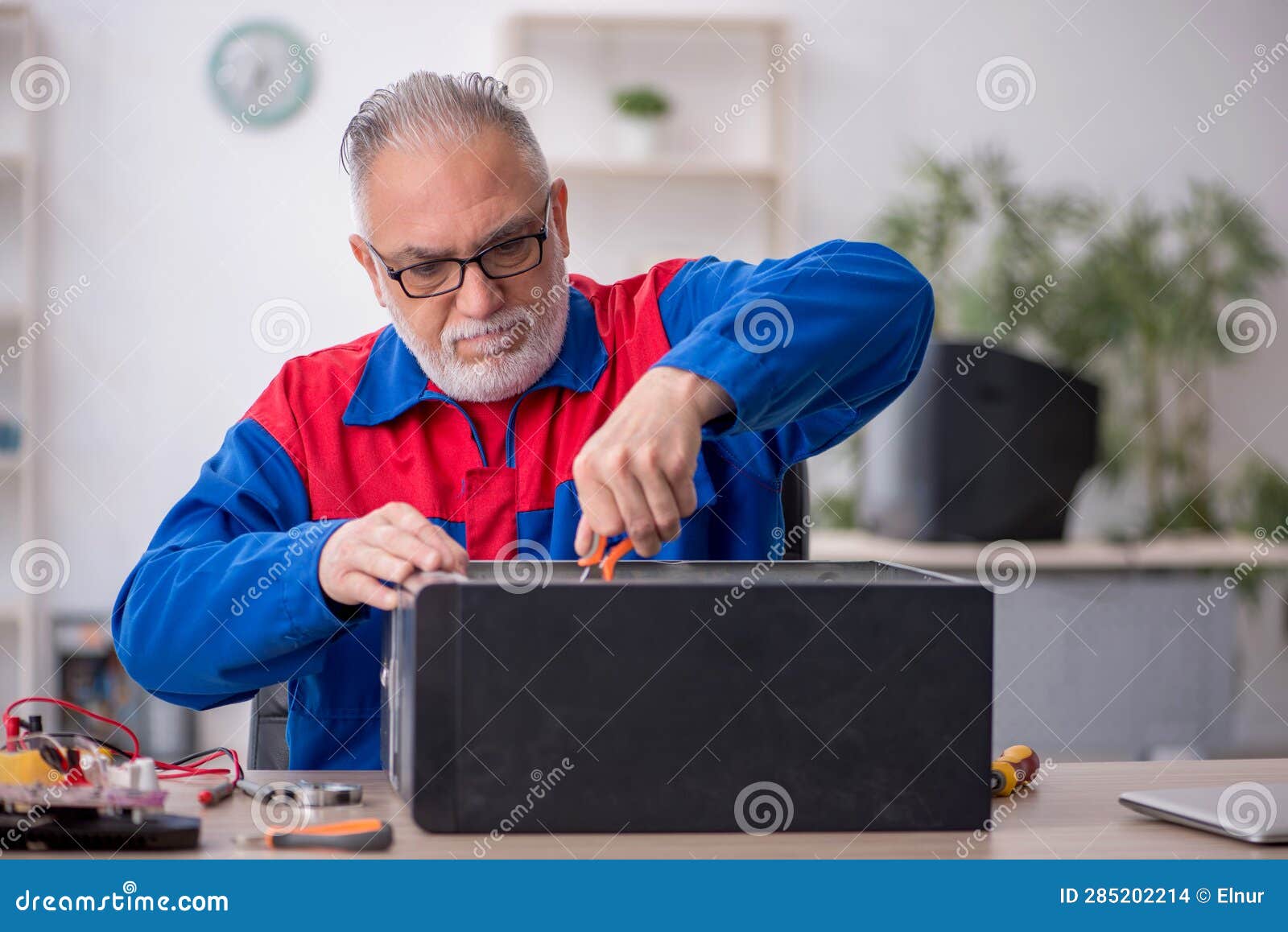 Old Male Repairman Repairing Computer Stock Photo - Image of pliers ...