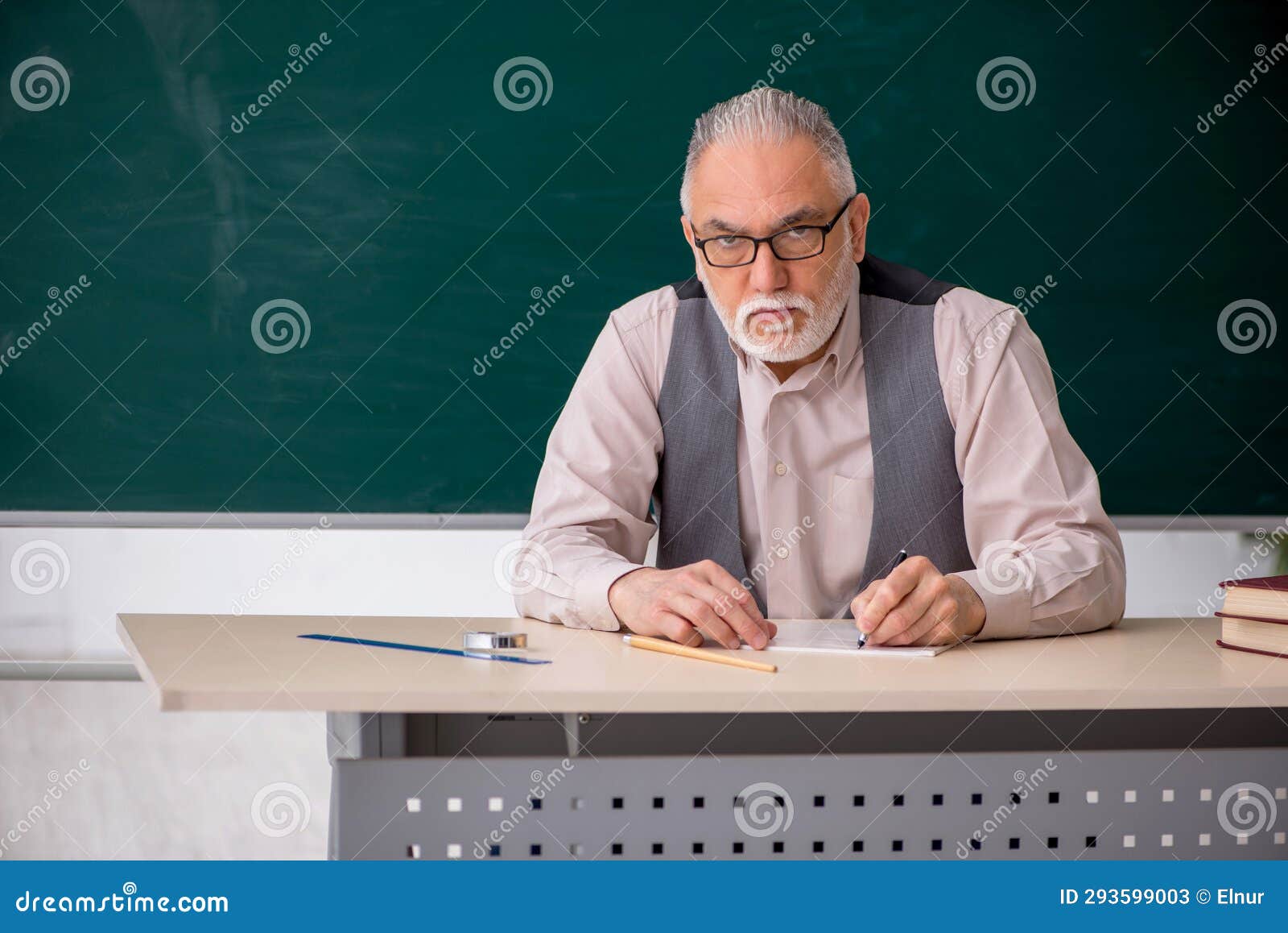 Old Male Teacher in the Classroom Stock Image - Image of checking ...