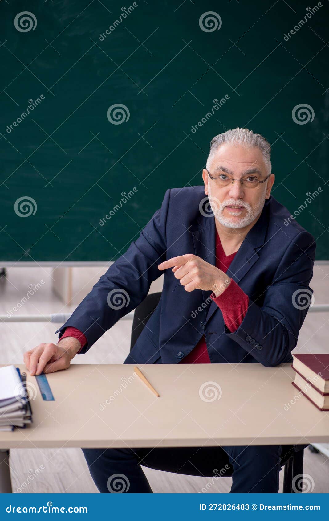 Old Male Teacher Sitting in the Classroom Stock Image - Image of ...