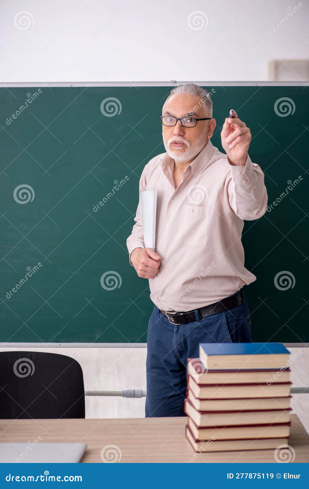 Old Male Teacher Sitting in the Classroom Stock Image - Image of ...