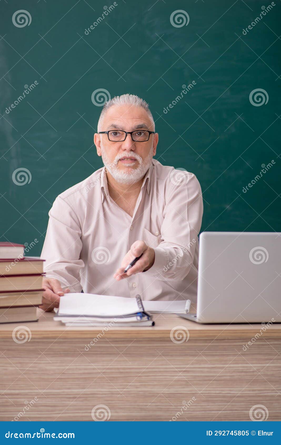 Old Male Teacher Sitting in the Classroom Stock Image - Image of ...