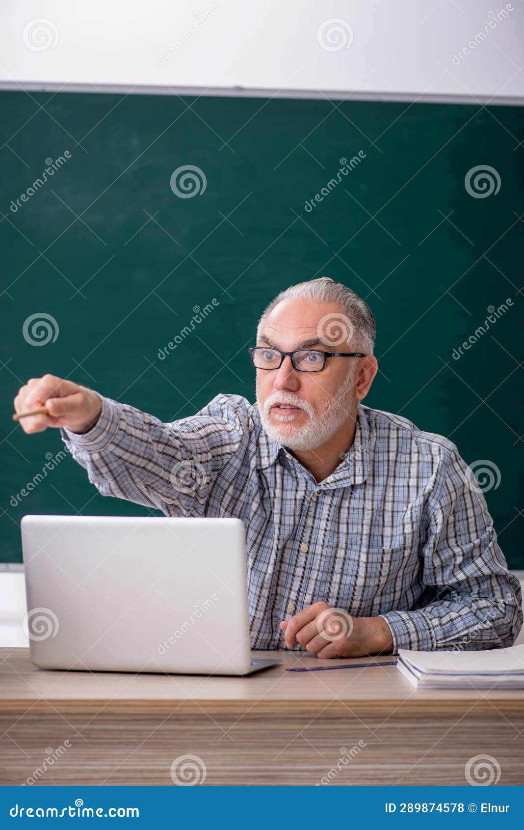 Old Male Teacher Sitting in Front of Green Board Stock Photo - Image of ...