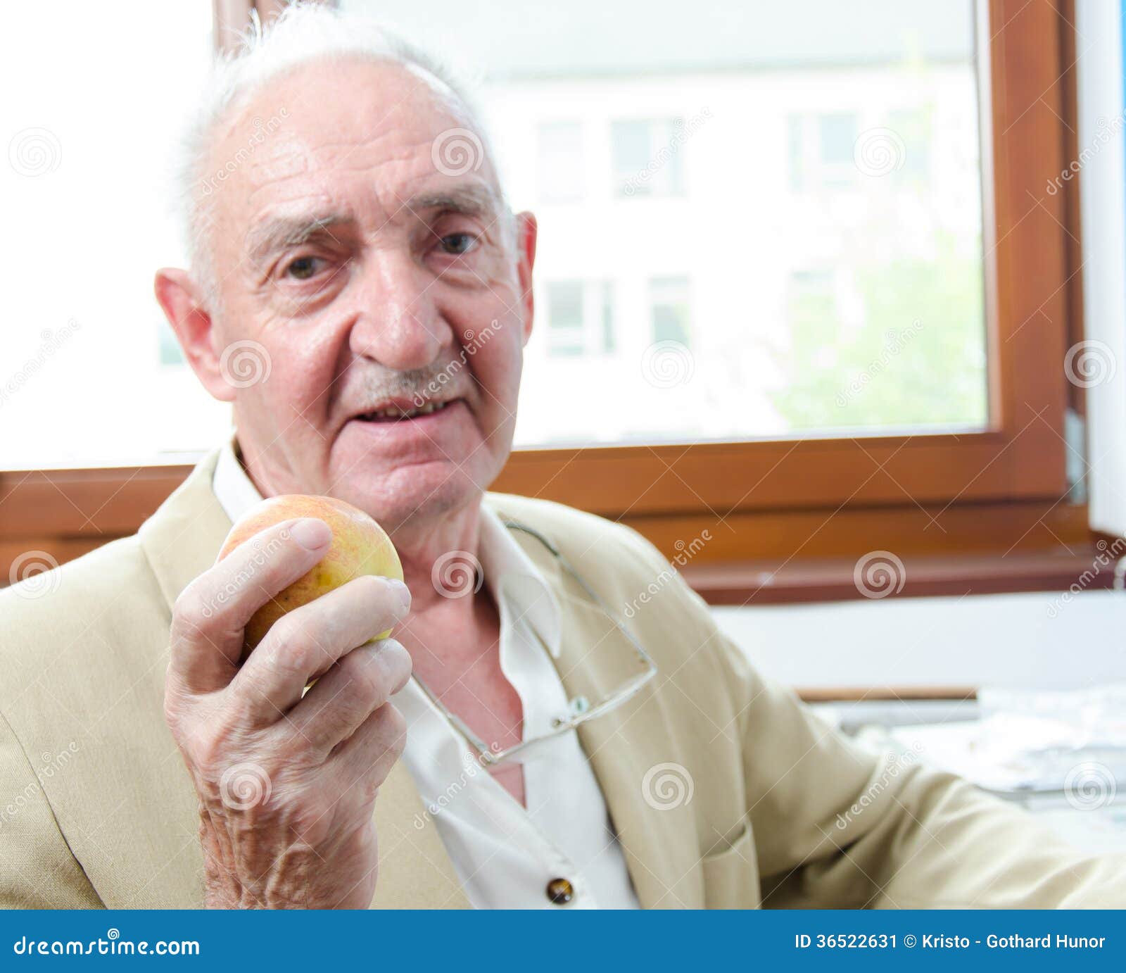 Old man with apple stock image. Image of friendly, person - 36522631