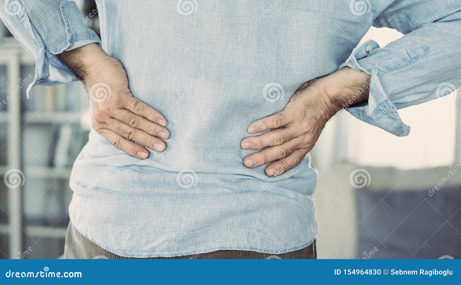 Old man with back pain stock photo. Image of person - 154964830