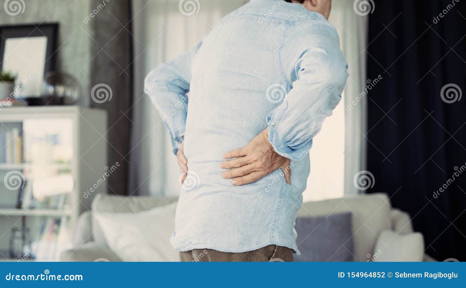 Old man with back pain stock photo. Image of massaging - 154964852