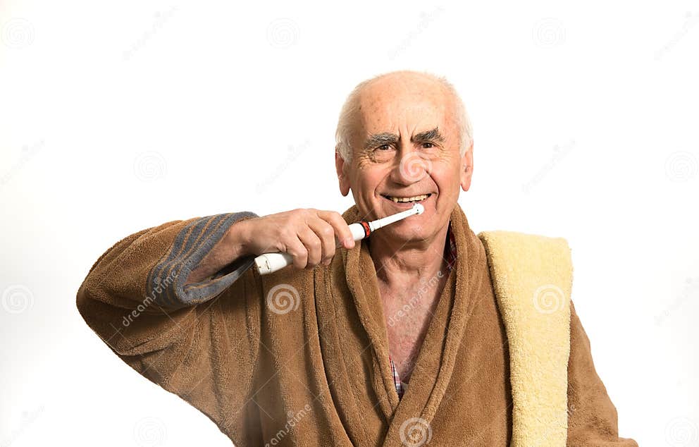 Old man brushing his teeth stock photo. Image of clean - 68220934
